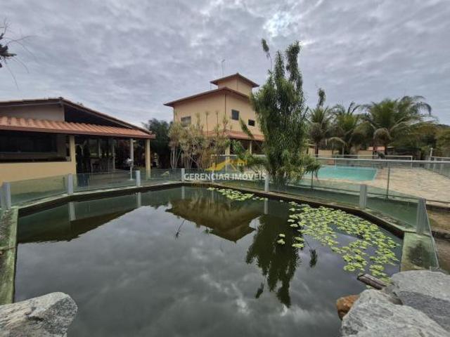 Chácara 2.410m² com piscina, suíte master, área gourmet e poço de peixes em Esmeraldas MG