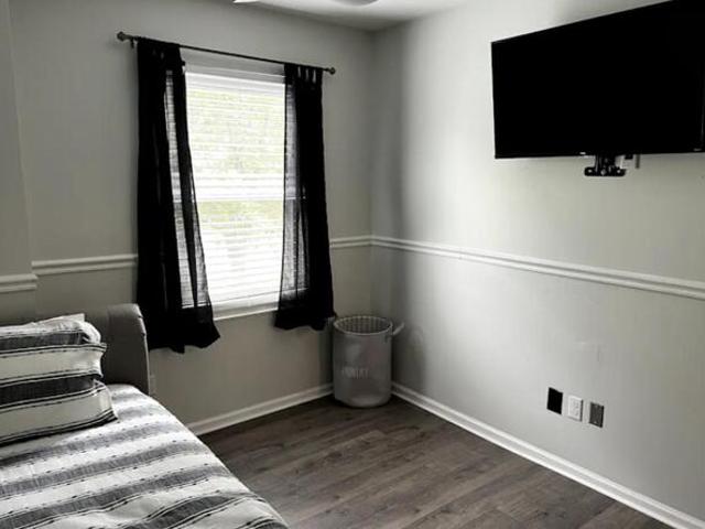 Charlotte House with Television and Sunroom. Comfortable & cozy