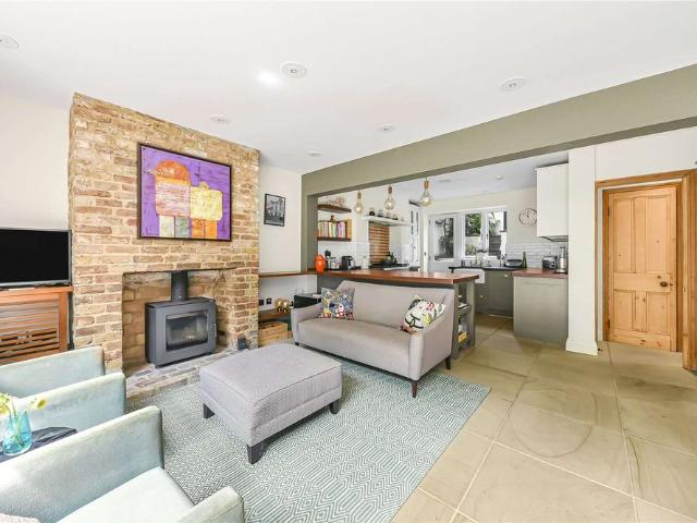 Charming 4 bedroom period home, in a secluded yet central location, fronting Hampstead Heath