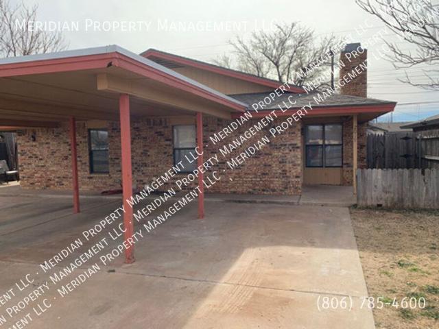Charming 2 Bedroom Home with Fireplace, Private Backyard & Covered Carport