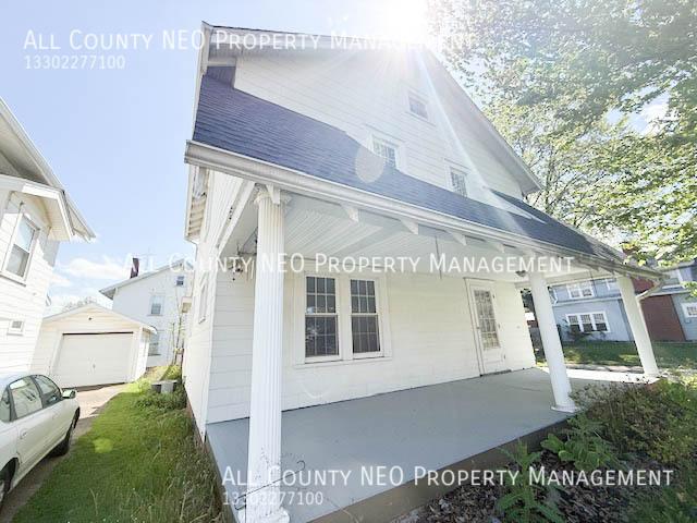 Charming 3 Bedroom Home with Huge Front Porch & Cozy Sunroom!