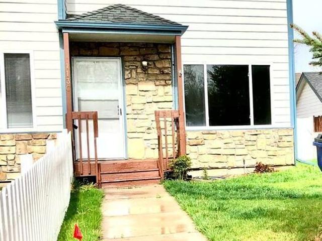 Charming 3 Bedroom Townhome with Finished Basement & Fenced Yards Near Downtown Milliken