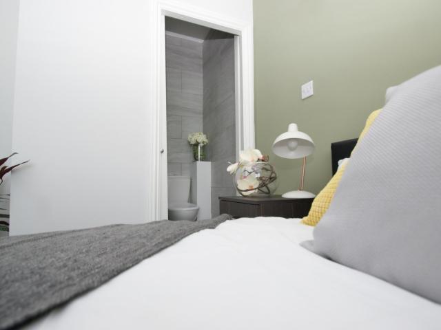 Charming double ensuite bedroom near the East Acton tube station Has a Room
