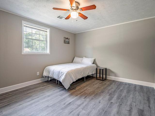 Charming Newly Renovated Home: Spacious Bedrooms with Modern Ceiling Fans, Stylish Upgrades, and High End Finishes Throughout!