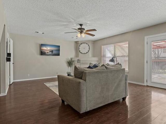 Charming Rue De Lis Home with Vaulted Ceilings & Fireplace