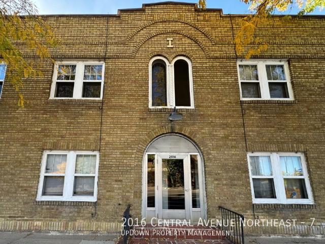 Charming Studio Living with Hardwood Elegance at 2016 Central Ave NE!