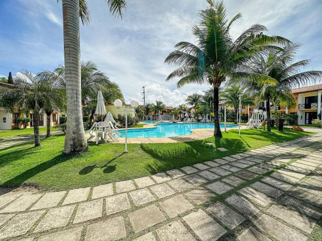 Com 3 suítes a 200m da praia de Taperapuã Axé Mói, piscina, sauna e portaria