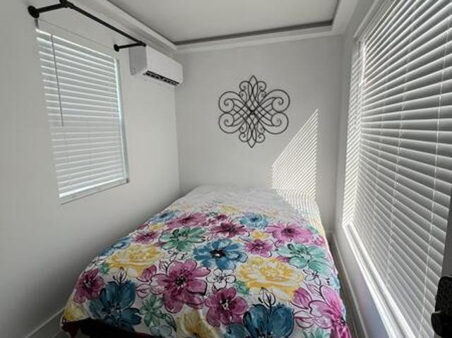 Comfortable & cozy Cedar Creek Tiny home with outdoor sitting area. Each bedroom has a dedicated TV