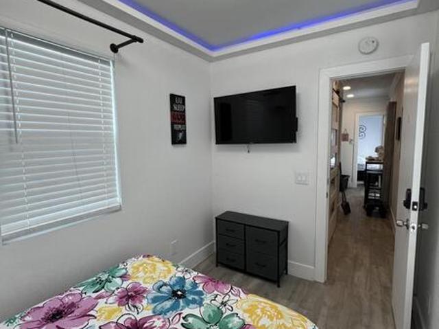 Comfortable & cozy Cedar Creek Tiny home with outdoor sitting area. Each bedroom has a dedicated TV