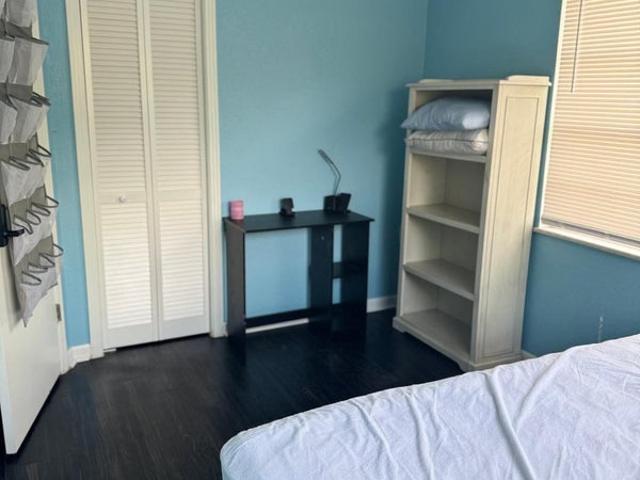 Common areas including living room and TV with lar