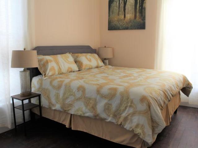 Completely furnished bedroom with an attached bath