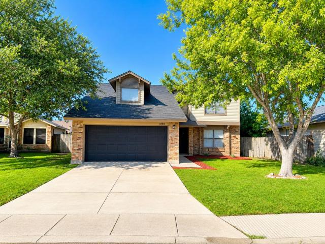 Completely updated Ventura beauty with over 2,000 square feet, TWO living areas, and a downstairs primary suite! Enjoy a modern island kitchen with granite countertops and stainless steel appliances plus incredible neighborhood amenities including a pool