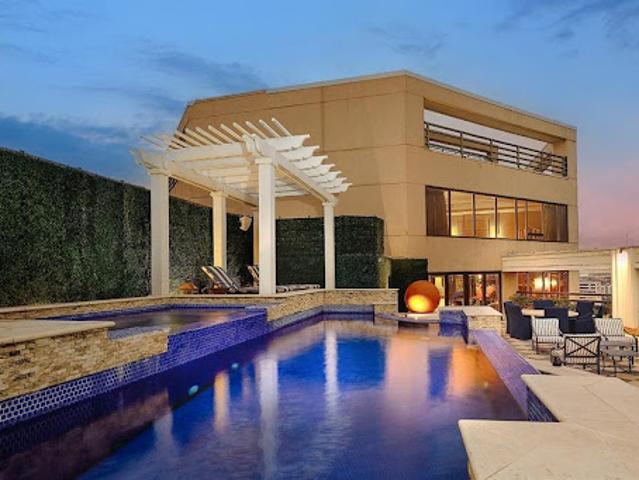 Contemporary apartment with pool