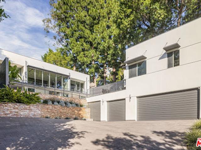 Contemporary house with pool and garden