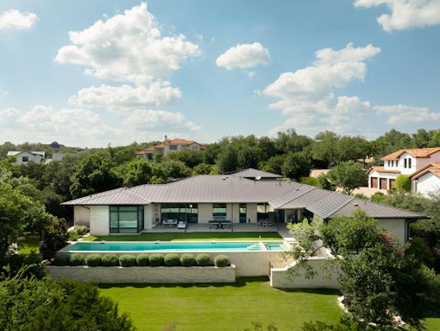 Contemporary house with pool and garden