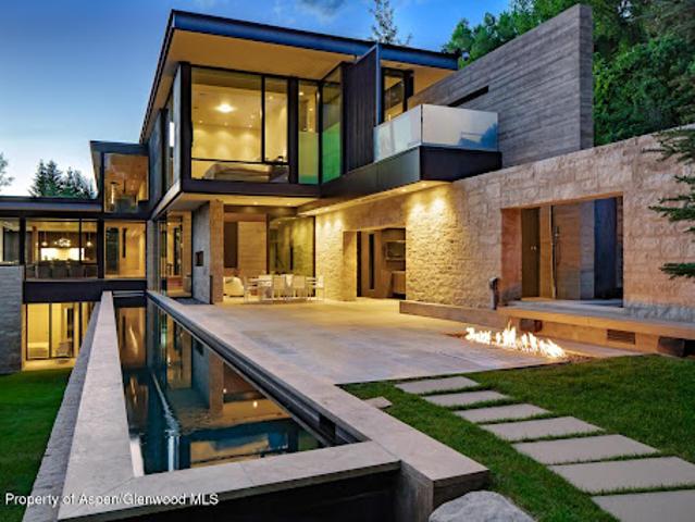 Contemporary house with pool and garden