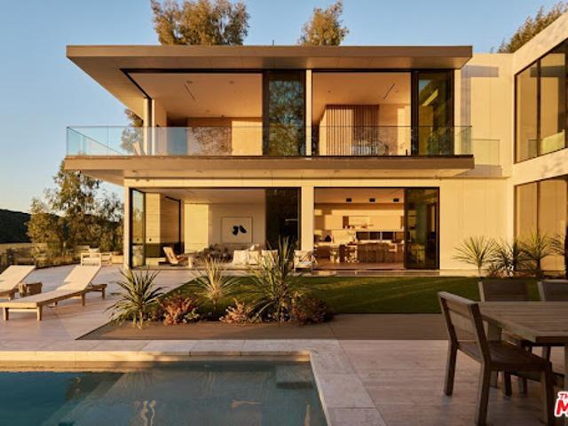 Contemporary house with pool and garden