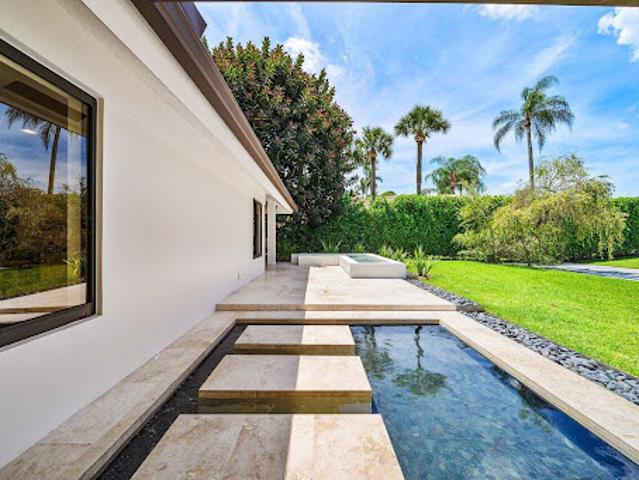 Contemporary house with pool and garden