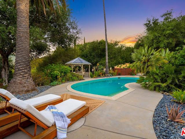 Contemporary house with pool and garden