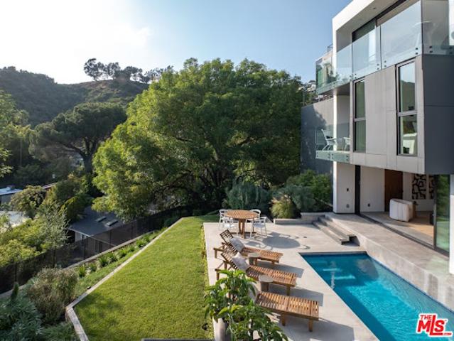 Contemporary house with pool and garden