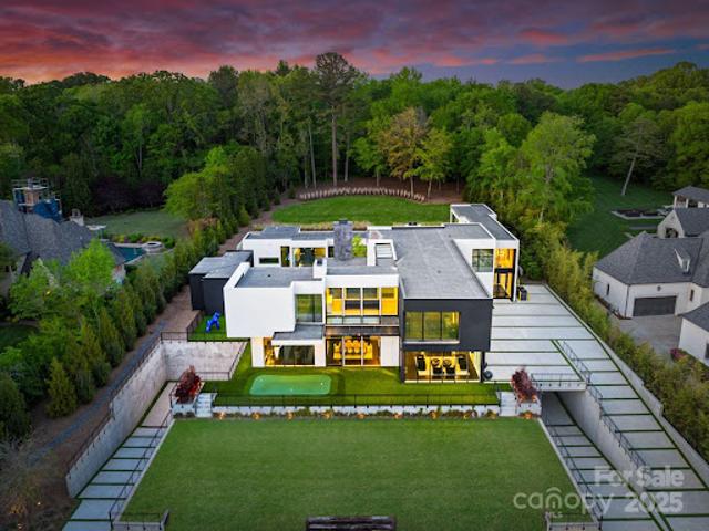 Contemporary house with pool and garden