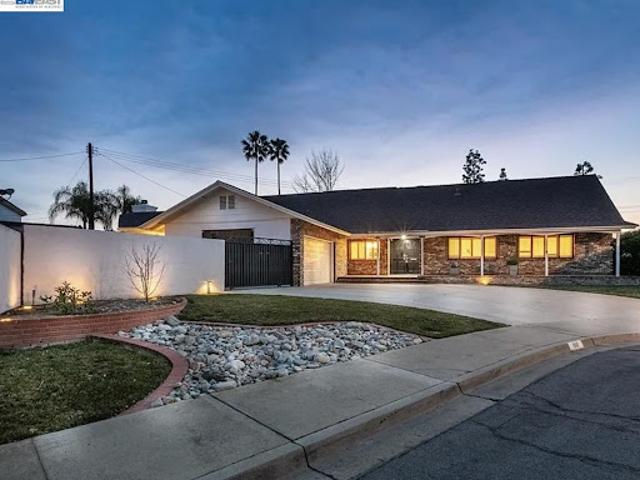 Contemporary house with pool and garden