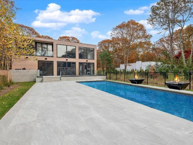 Contemporary house with pool and garden