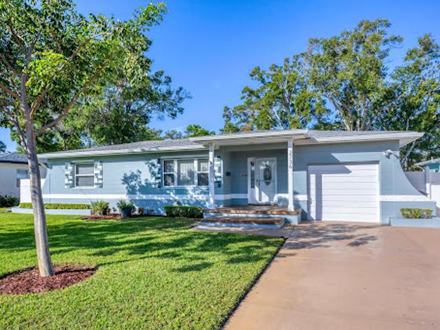Contemporary house with pool and garden