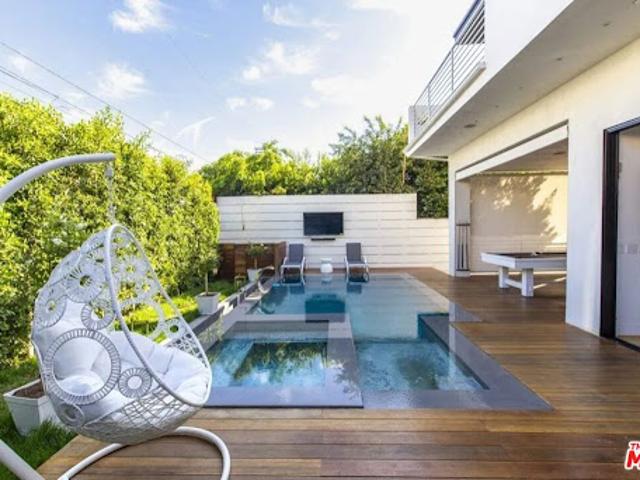 Contemporary house with pool and garden