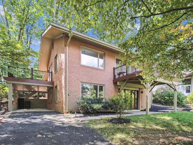 Contemporary house with pool and garden