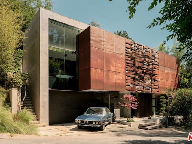 Contemporary house with pool and garden