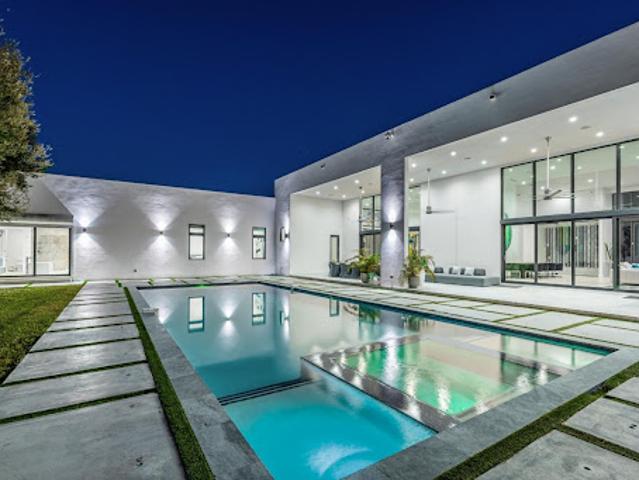 Contemporary house with pool and garden