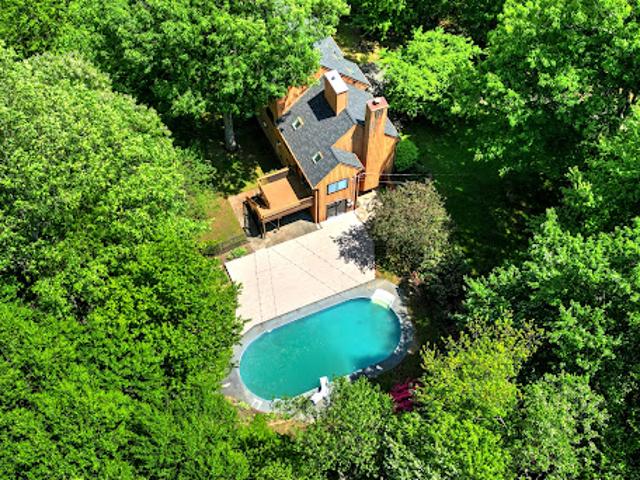 Contemporary house with pool and garden