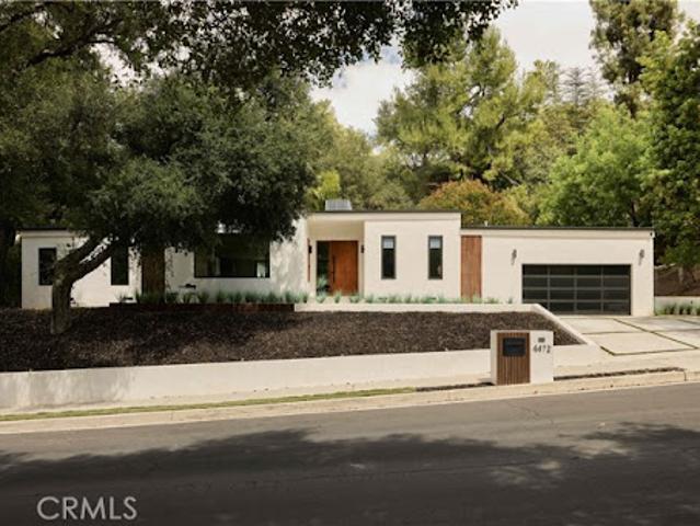 Contemporary house with pool and garden