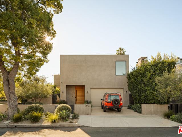 Contemporary house with pool and garden