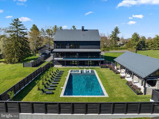 Contemporary house with pool and garden
