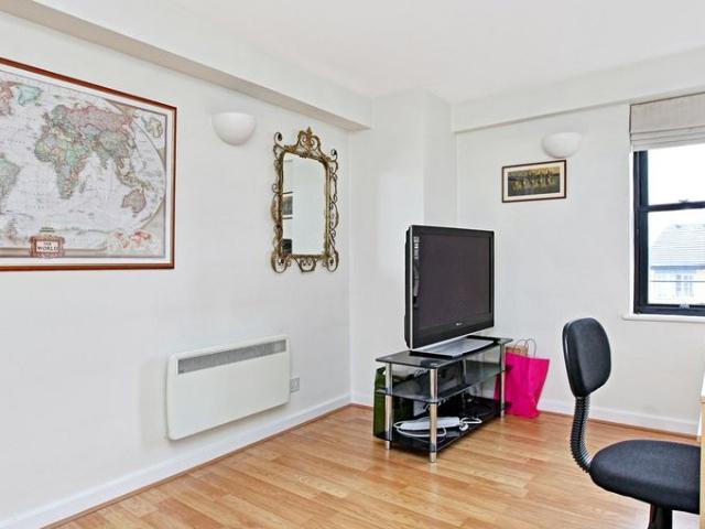 Contemporary two double bedroom unfurnished apartment with an open plan reception and private balcony, situated moments from the amenities of Shad Thames
