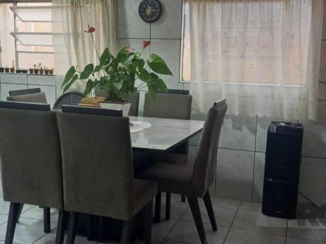 Convido você a conhecer esta encantadora casa, localizada em Gravataí/RS