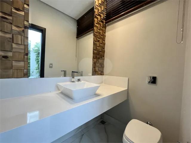 Casa à venda com 4 suítes no condomínio Alphaville Nova Esplanada 1, Votorantim SP