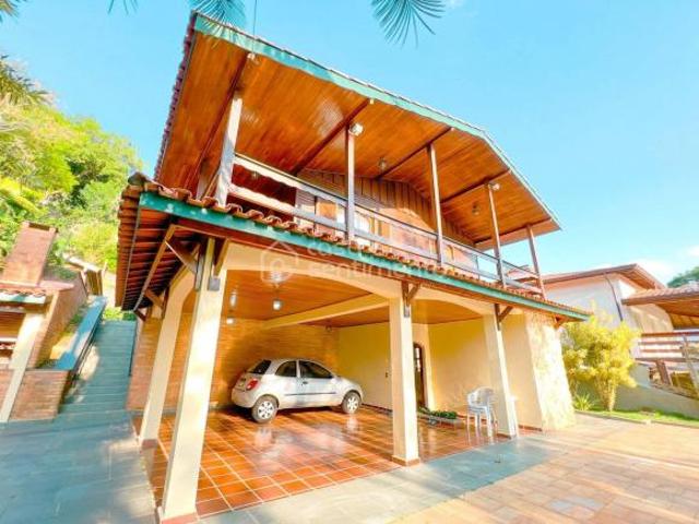 Condomínio Marambaia Casa de madeira com 5 quartos, 309m², piscina à venda no Condomínio Marambaia