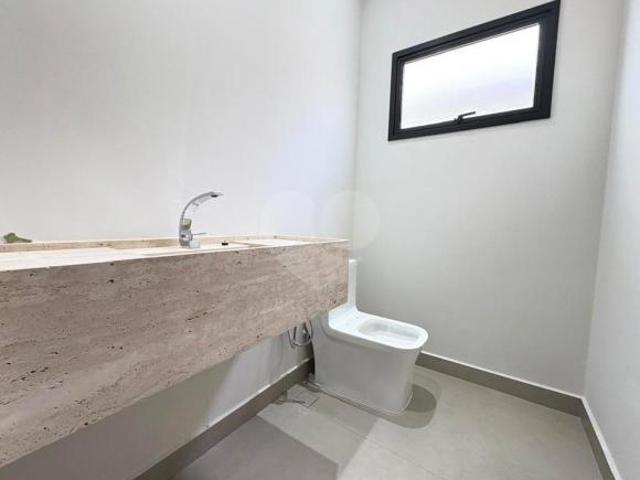 Casa à venda com 3 suítes no condomínio Parque Faber IV, São Carlos