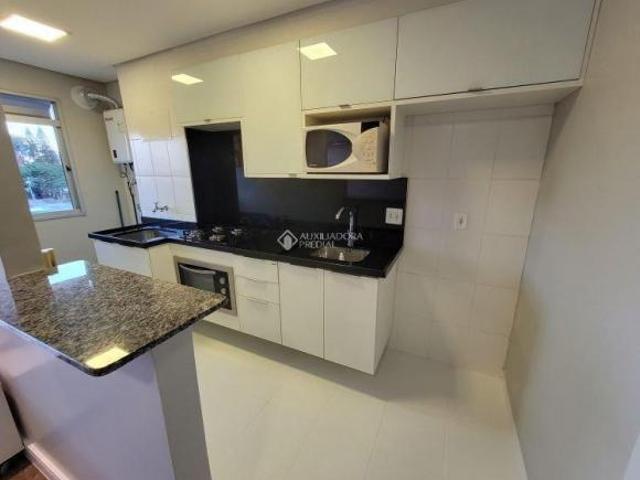 condominio dois dormitorios semi mobiliado garagem escriturada elevador