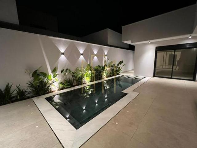 Condomínio Splendido: Luxuoso imóvel de 3 suítes no Jardim Botânico, Uberlândia MG 214m², 4 vagas