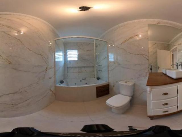 Deslumbrante casa para venda em Centro com 4 quartos, sendo 3 suítes, 210m²