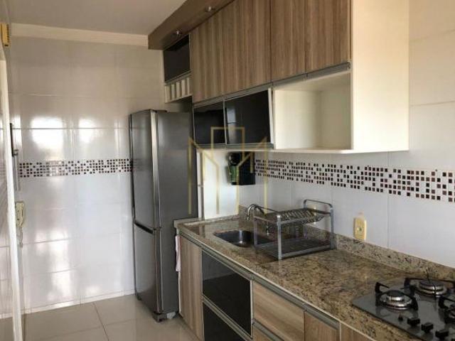 Conforto e Localização:* Apartamento de 65 m², situado ao lado da Avenida João Naves de Ávila, of