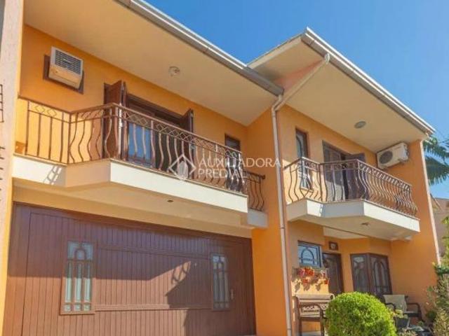 Conforto e Localização no Moinhos de Vento Canoas | Casa com Suíte, Escritório e Espaço Gourmet