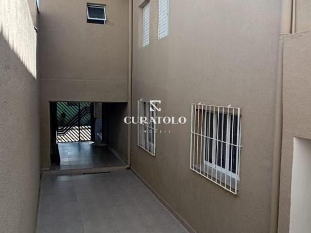 Conheça esta linda casa à venda em Santo André, Vila Homero Thon. Com 4 quartos, 4 vagas e amplo qui