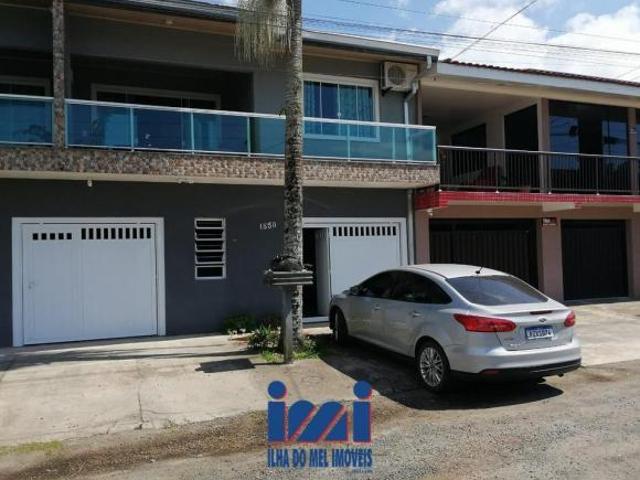 Conjunto Residencial Contendo 03 Apartamentos