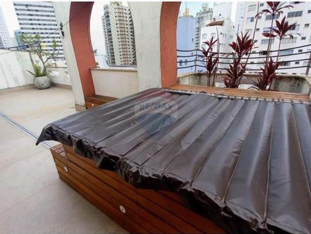 Cobertura 3 dormitórios e jacuzzi a duas quadras da praia das Astúrias, no Guarujá, SP