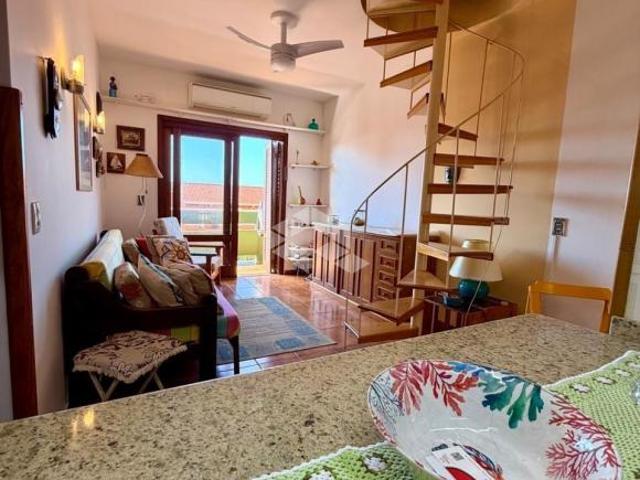 Cobertura Amplo de 1 suíte mobiliado com sacada, vaga de garagem e Vista Mar em Capão da Canoa!